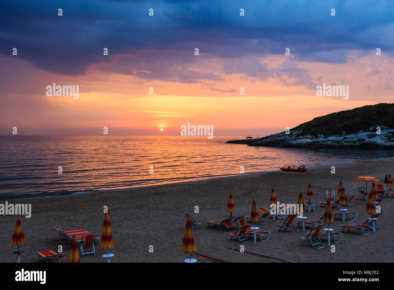 Summer evening sunset Spiaggia di Sfinale Adriatic Sea beach (Vieste ...