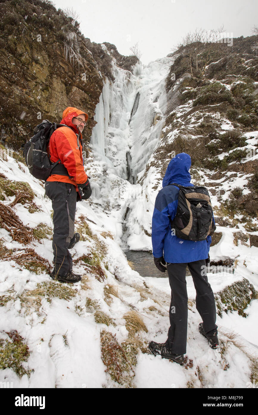 A frozen waterfall at Force Crag near Keswick during March 2018, Lake ...