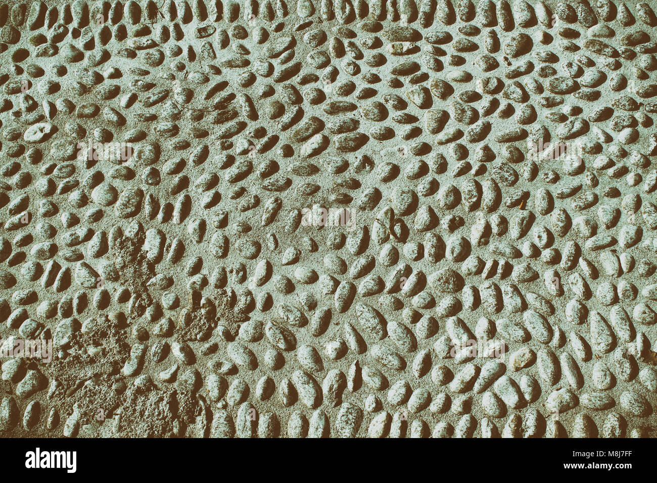 Nice background image of pebbles, round rocks texture Stock Photo - Alamy