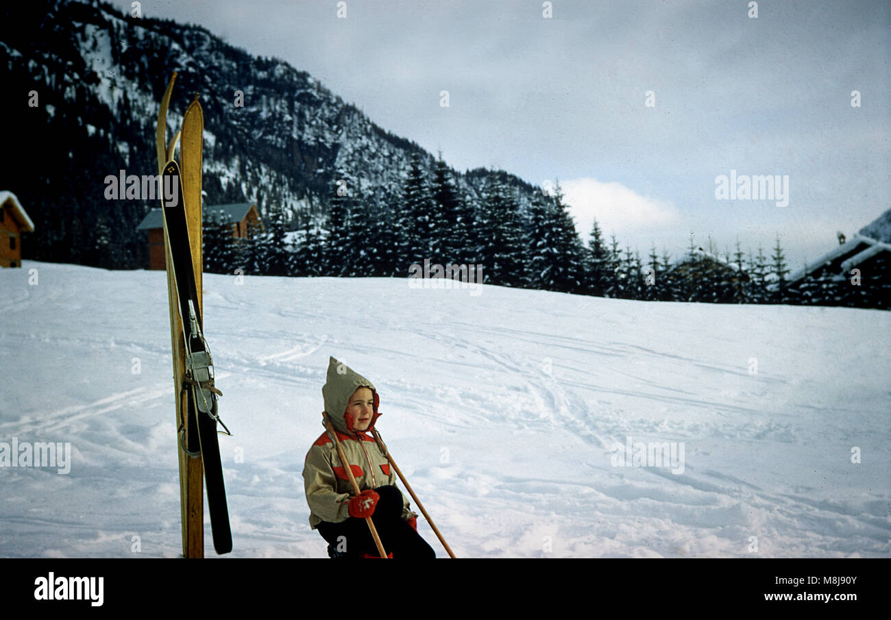 old time ski images from the 1950's, young skier resting, Italian Alps ...