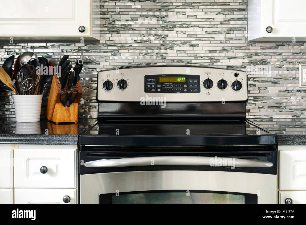 Stove closeup in modern kitchen interior Stock Photo - Alamy