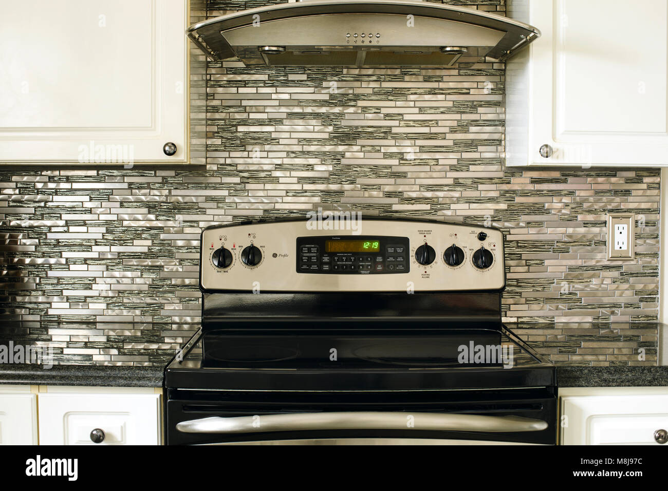 Stove closeup in modern kitchen interior Stock Photo - Alamy
