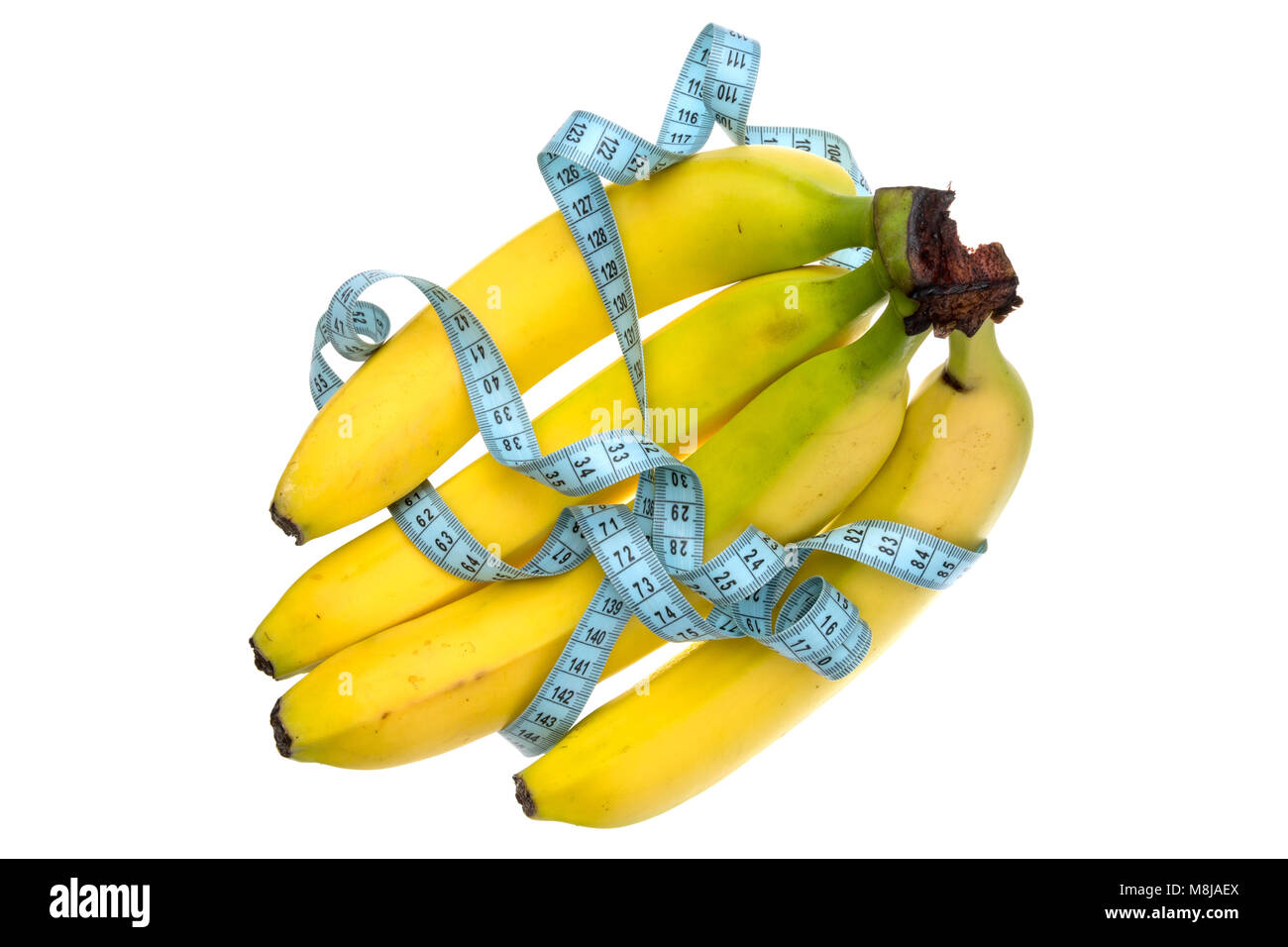 Bunch of banana and measuring tape isolated on white background ...
