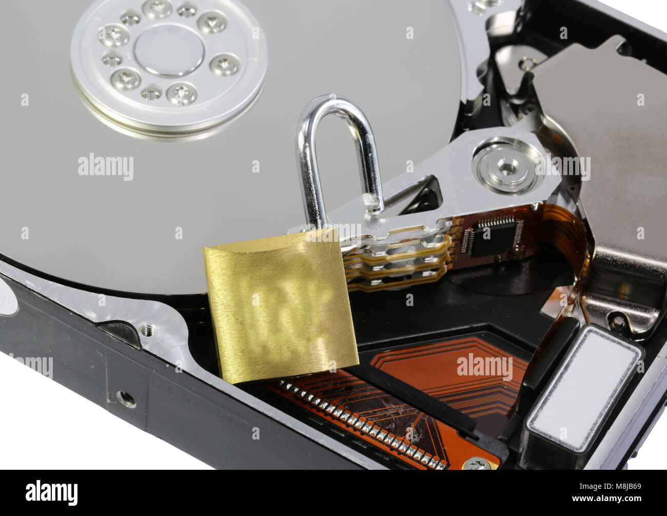 white background and hard drive of a computer with a padlock to secure ...