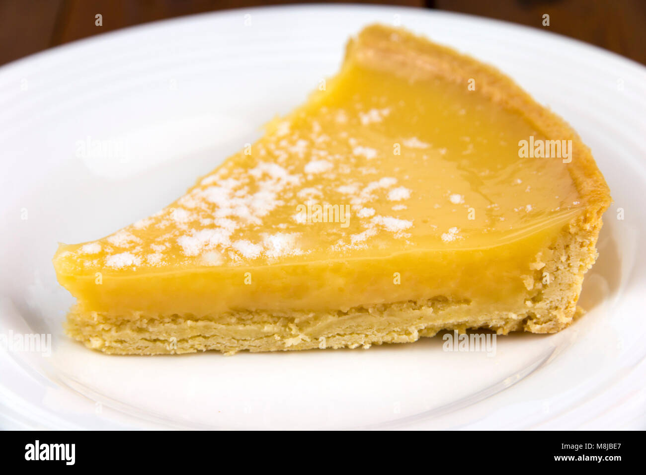 Slice of lemon tart hi-res stock photography and images - Alamy