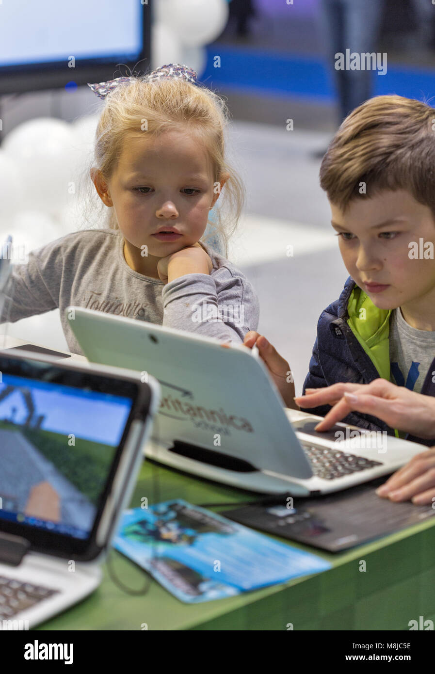 KIEV, UKRAINE - OCTOBER 08, 2017: Kids visit Microsoft, American ... KIEV, UKRAINE - OCTOBER 08, 2017: Kids visit Microsoft, American ...