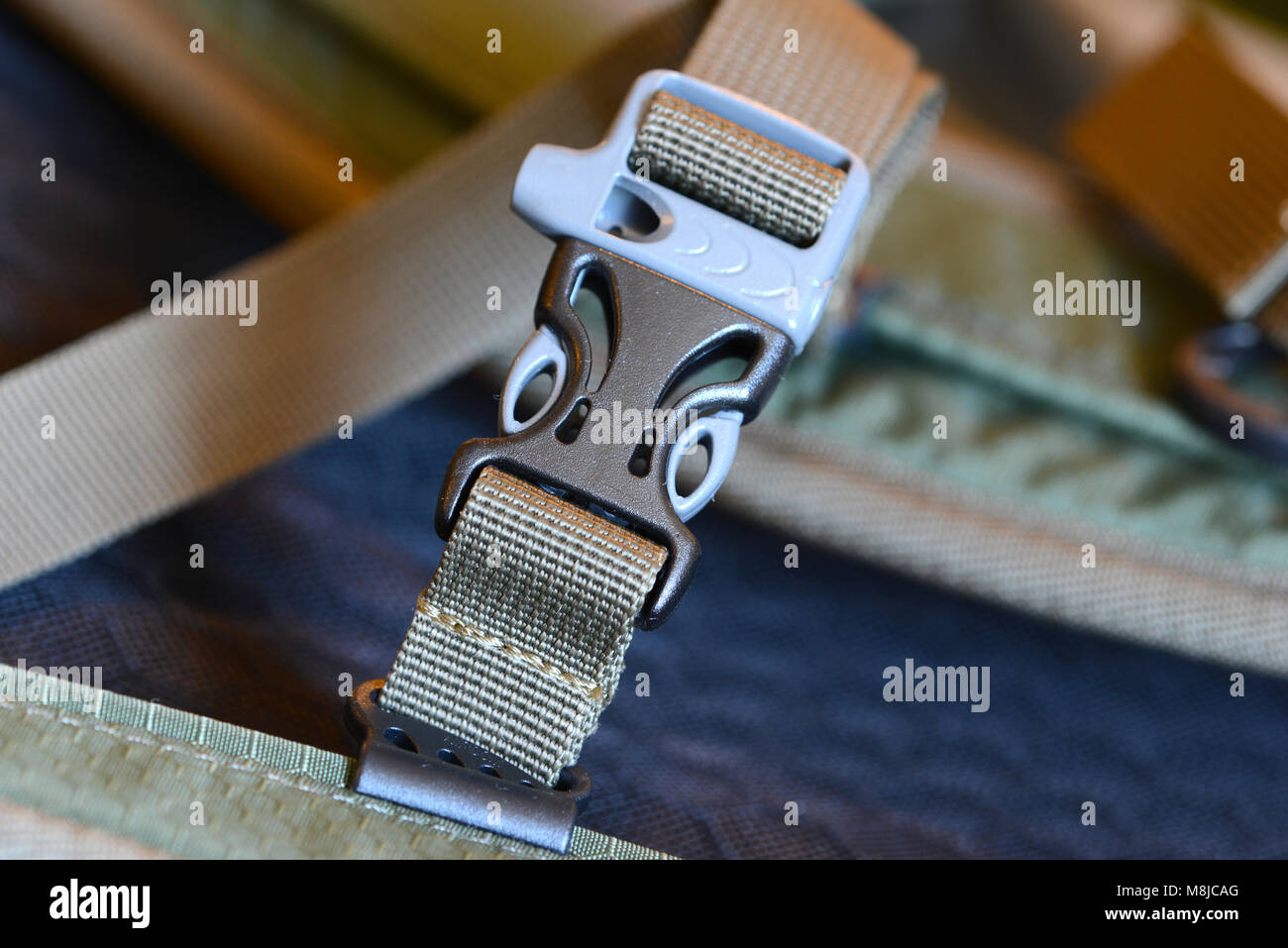 Closeup of nylon backpack with plastic straps, belts and clips Stock ...