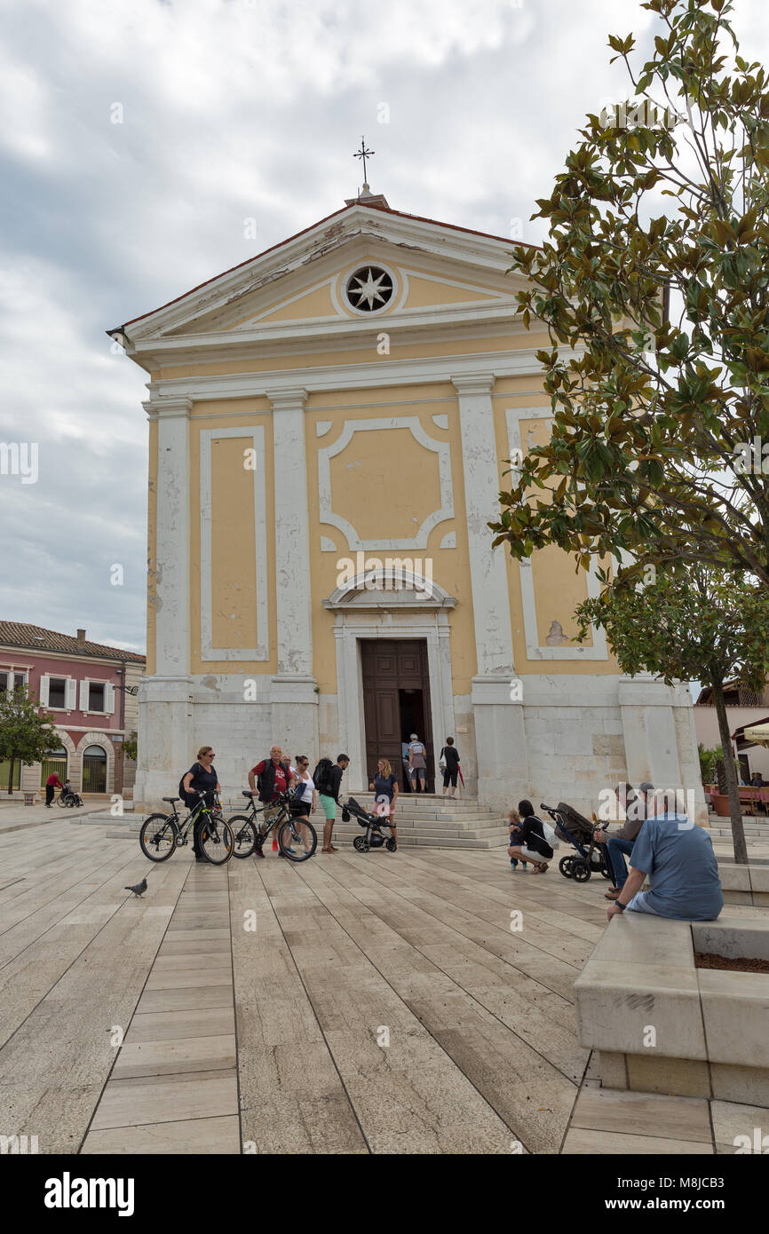 POREC, CROATIA - SEPTEMBER 21, 2017: People visit Church of Our Lady of ...