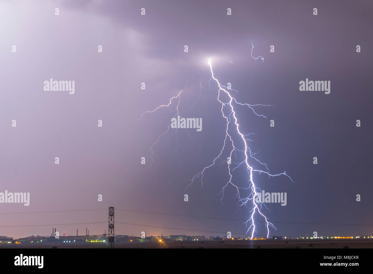 Lightning flash over a city, Thunderstorm , electricity blast storm ...
