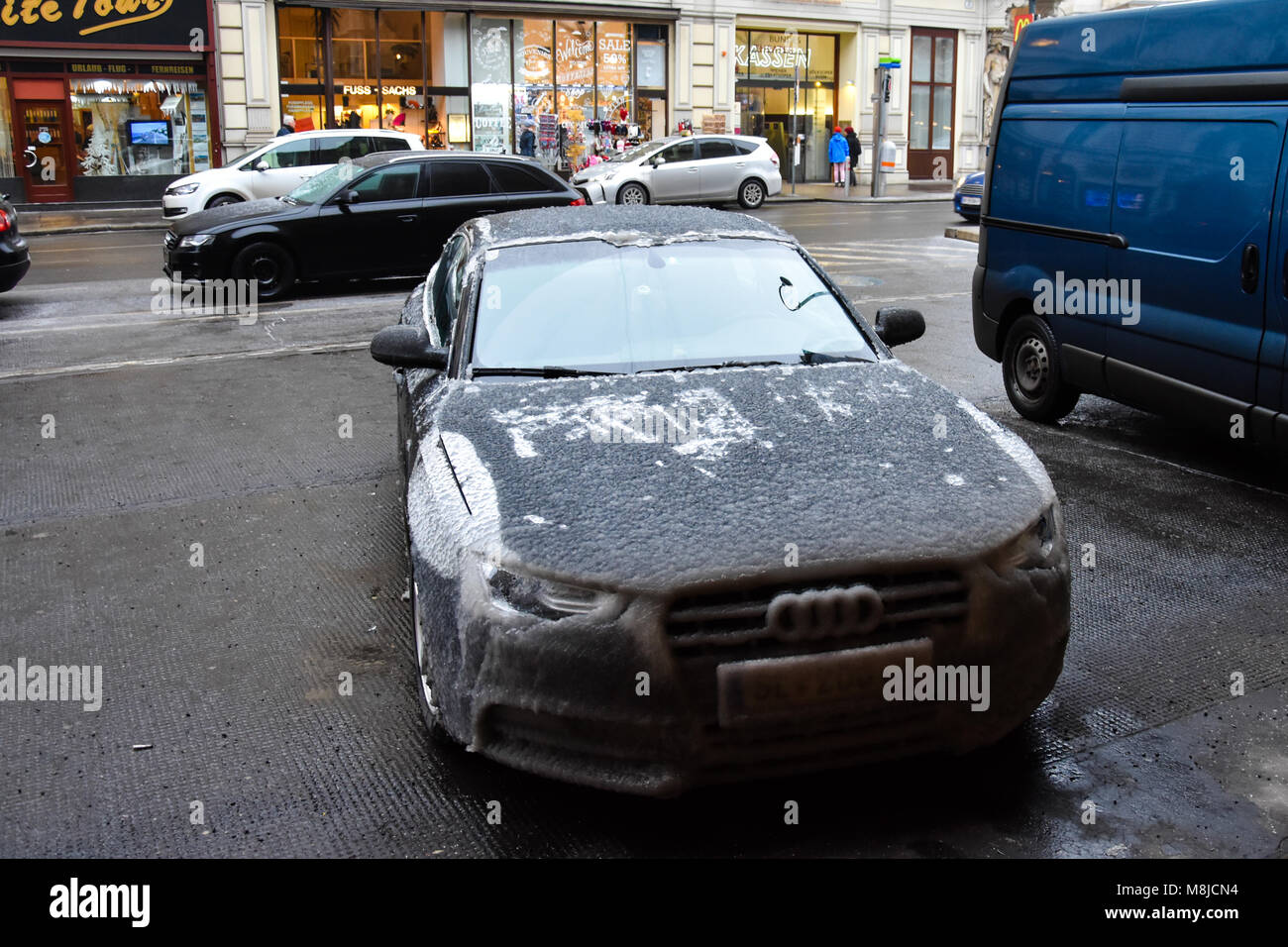 Vienna, Austria. January 31, 2017. Frozen Audi car after a snowfall and ...