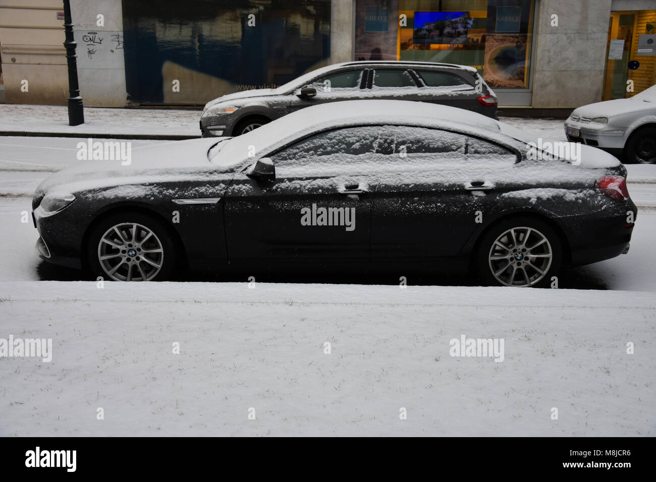 Vienna, Austria. January 31, 2017. Snowy BMW car after a snowfall and a ...