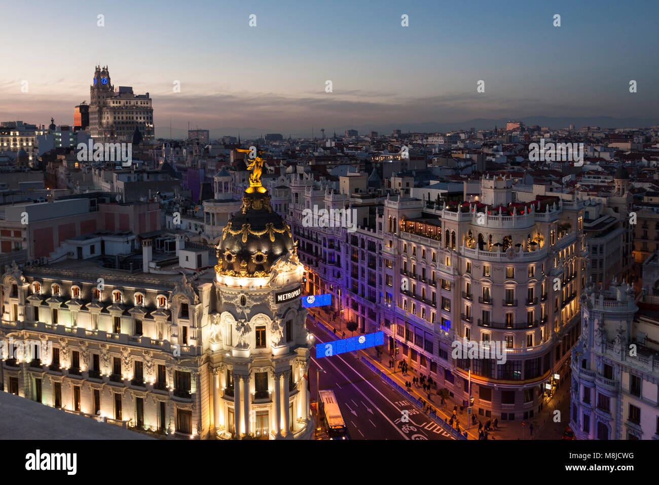 The rooftops of buildings in Madrid stretch as far as the eye can see ...