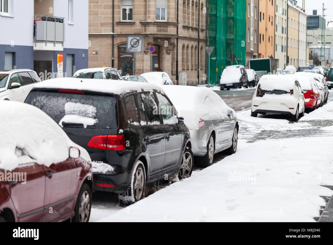 snowbound german cars parked at the roadside Stock Photo - Alamy