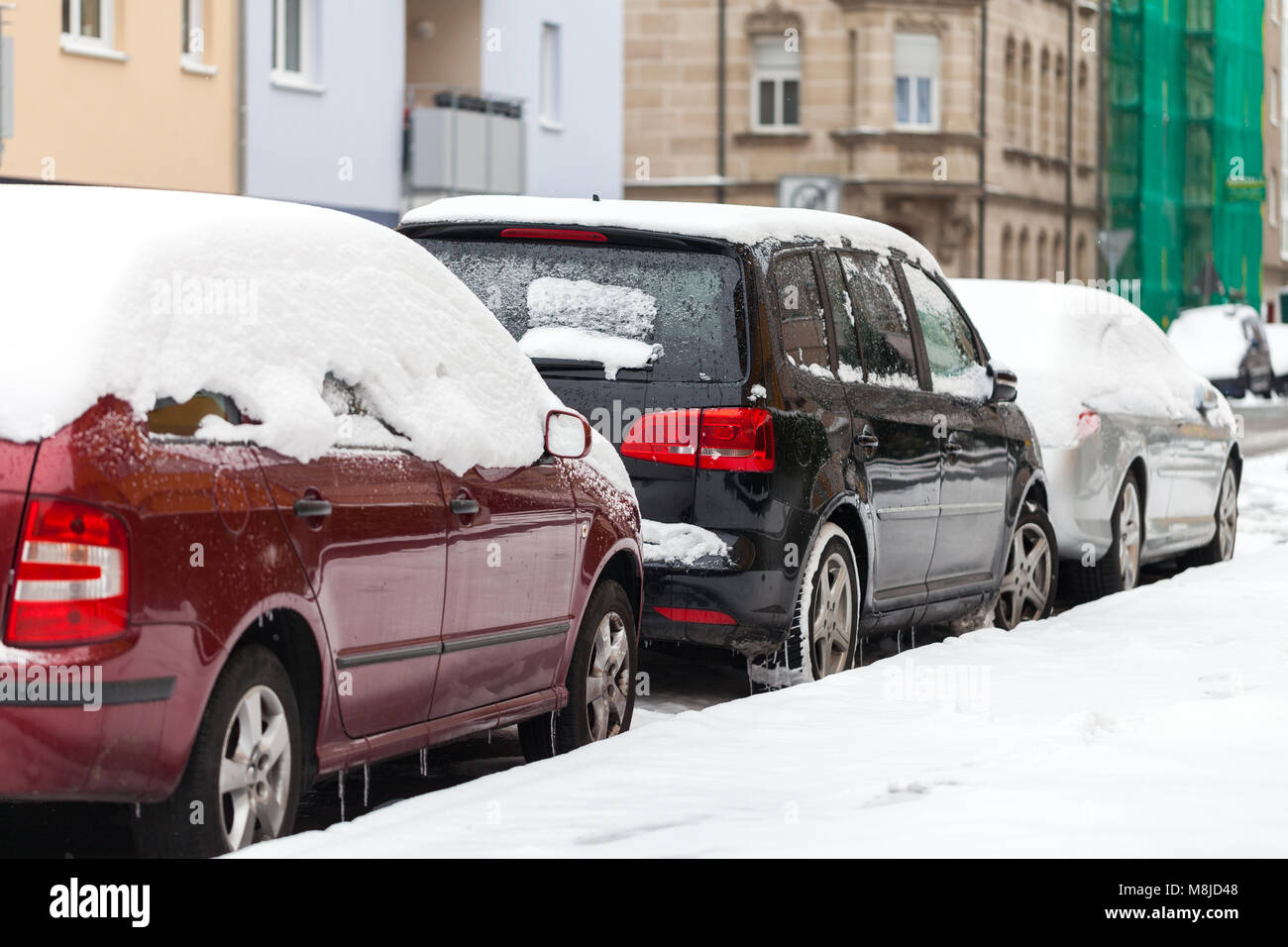 snowbound german cars parked at the roadside Stock Photo - Alamy