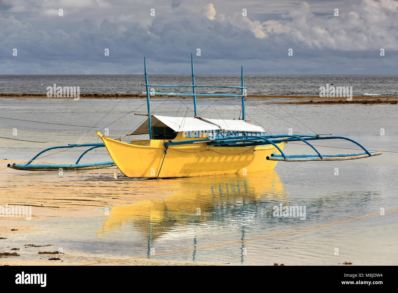 Balangay or bangka double-outrigger boat for touristic use of the ...