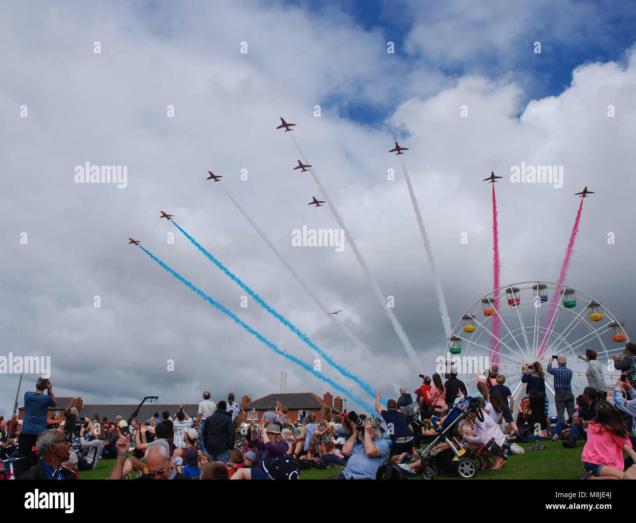 The RAF Red Arrows display team fly over Barry Island at the start of ...