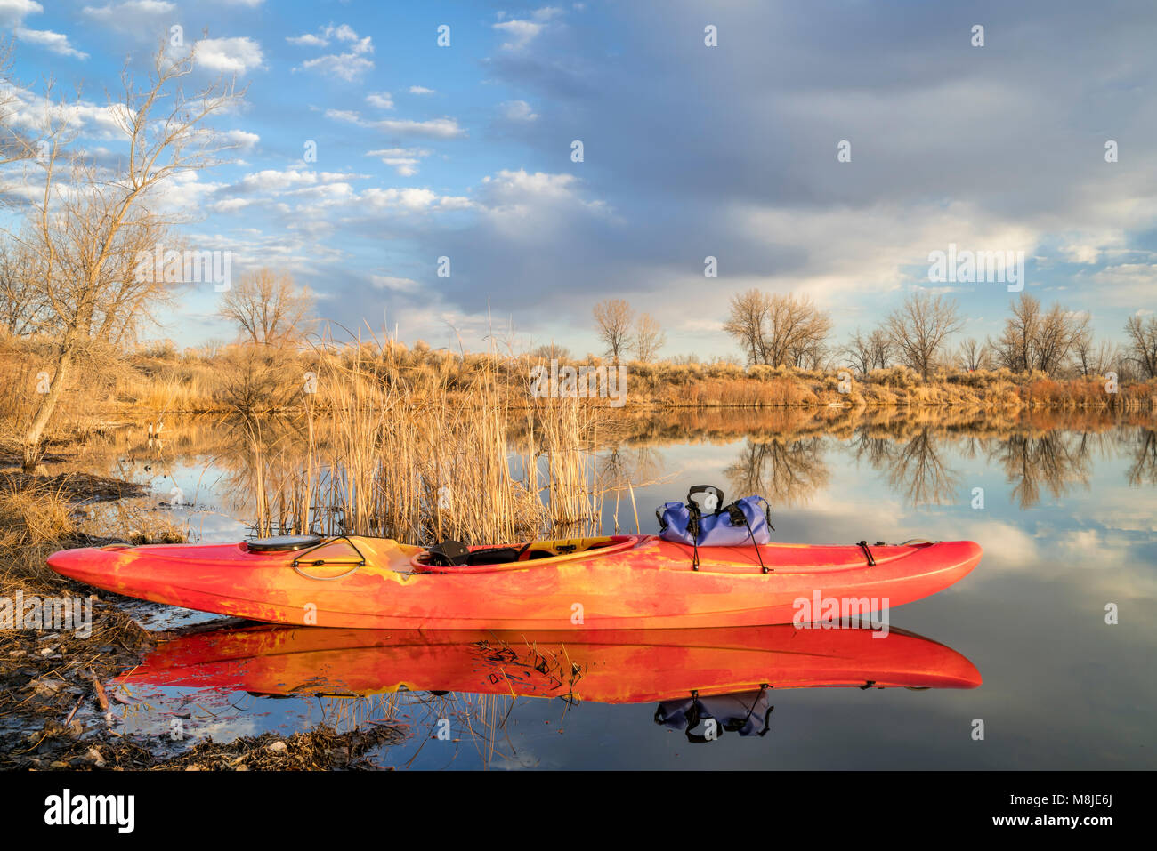 whitewater kayak on a calm lake in Colorado, early spring scenery Stock ...