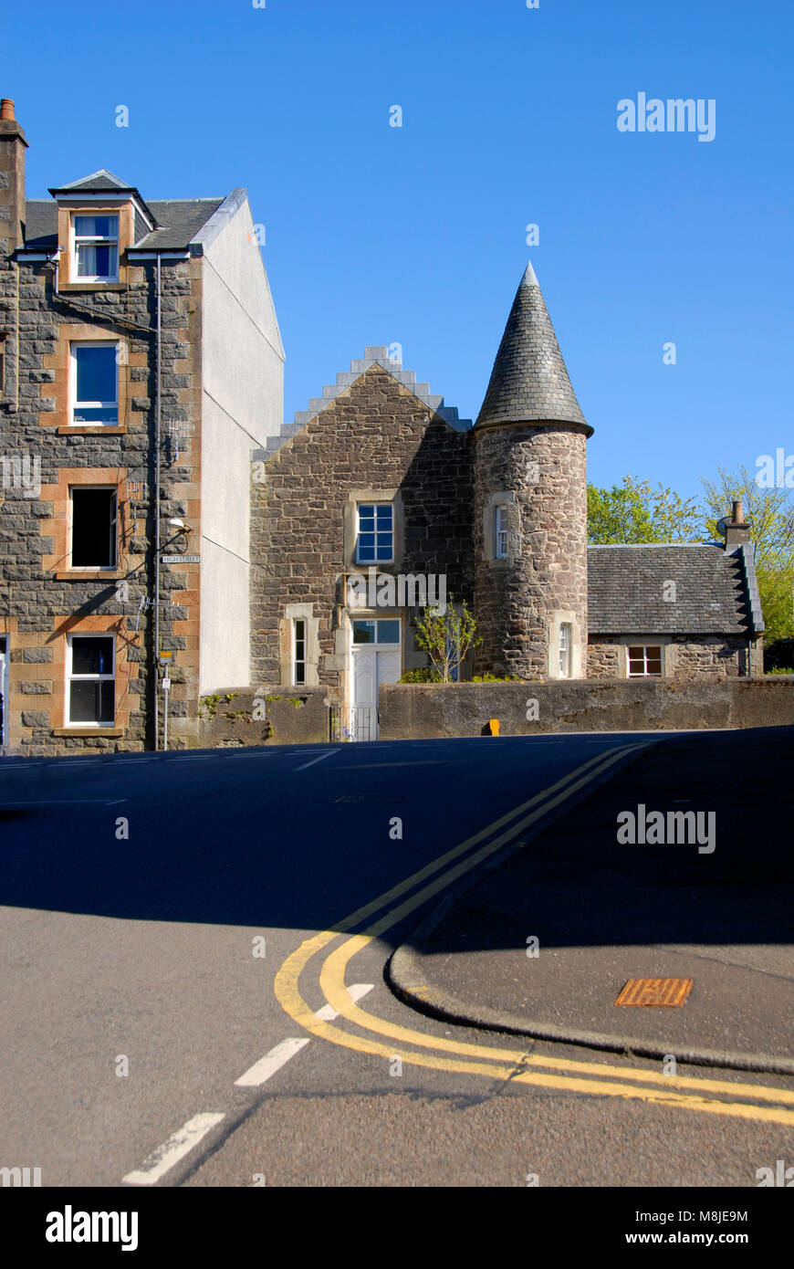 Stone house with round tower and conical roof, Oban, Scotland Stock ...