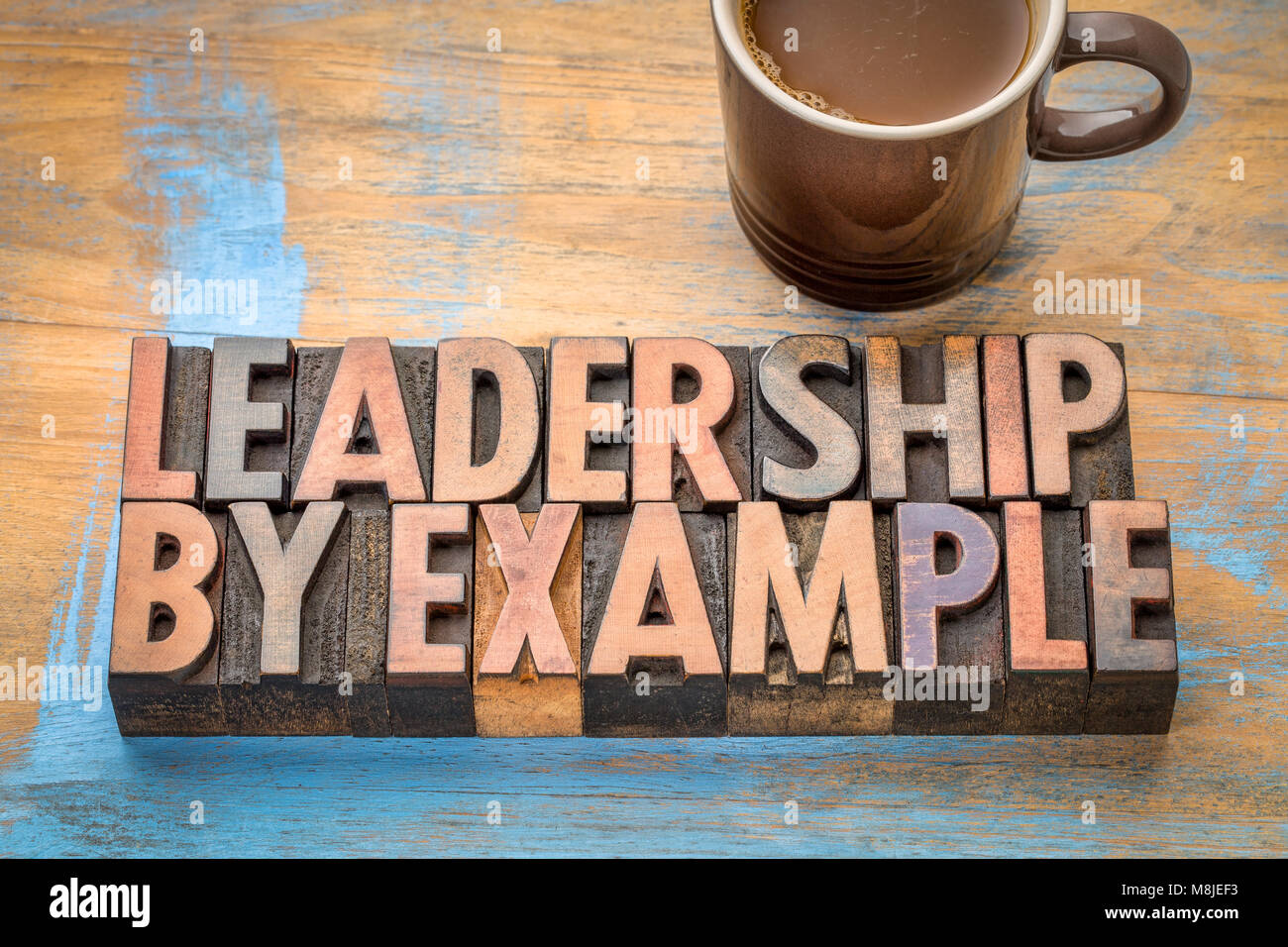 leadership by example - word abstract in vintage letterpress wood type ...