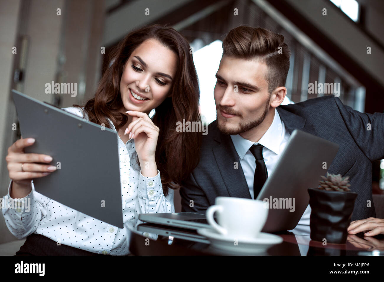 Young professionals work in modern office.Business crew working with startup Stock Photo - Alamy