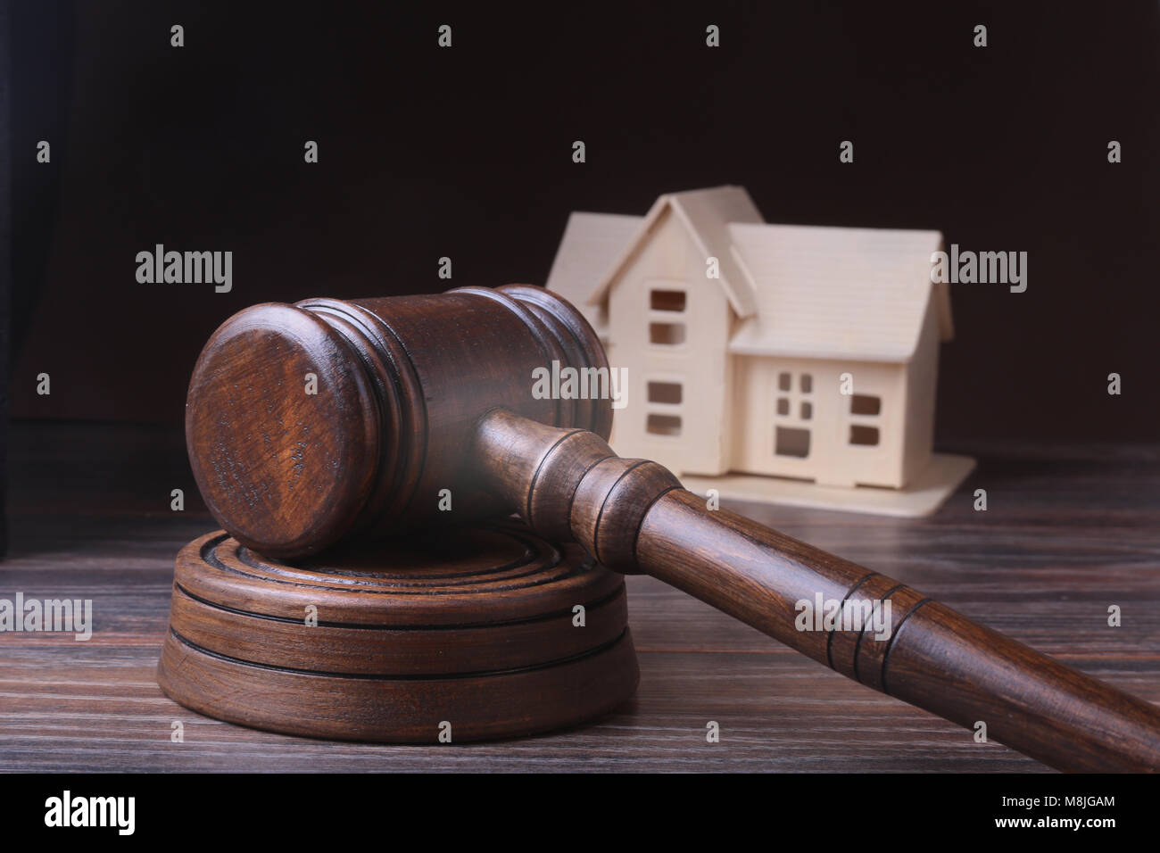 House Auction, auction hammer , symbol of authority and Miniature house ...