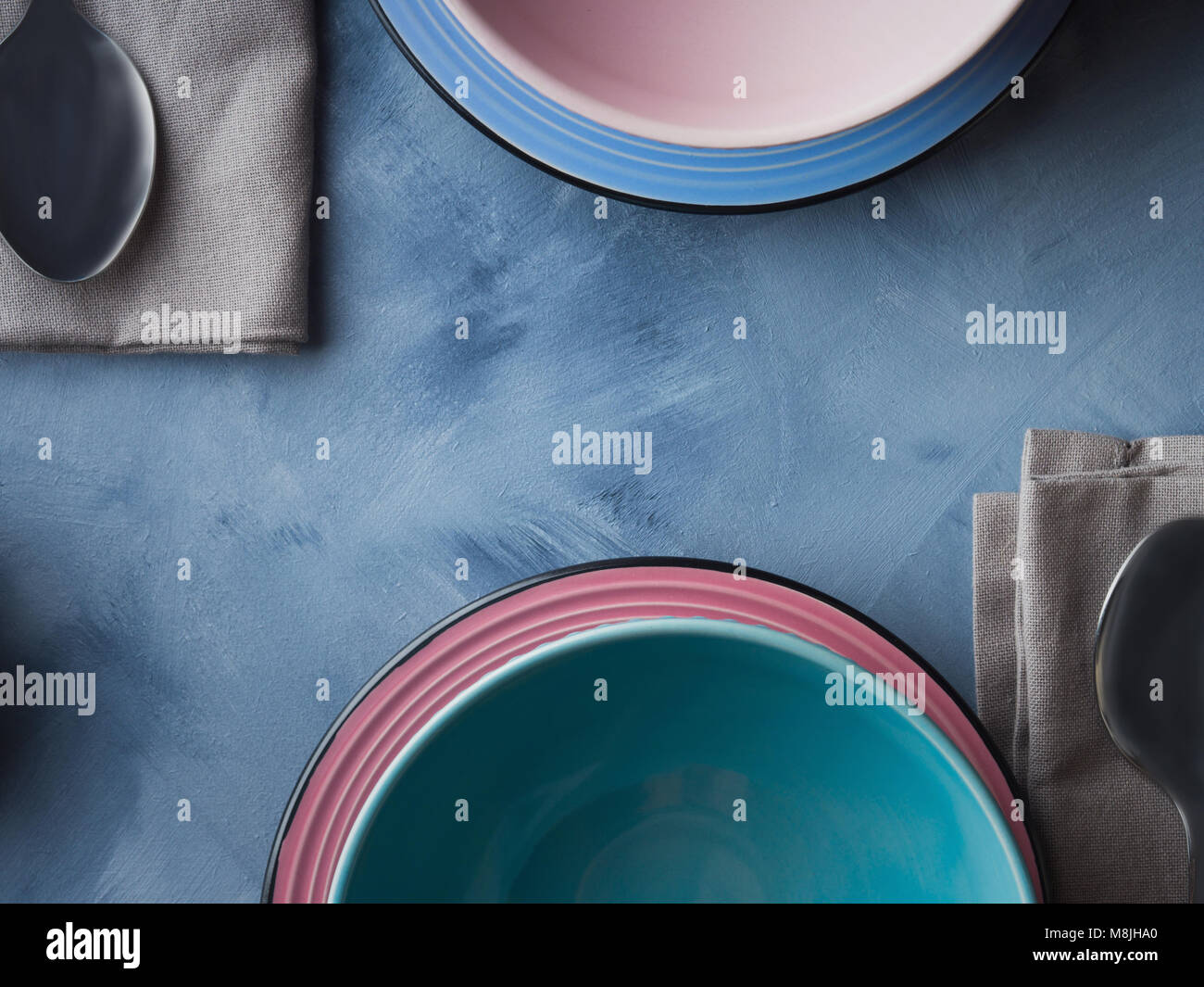 Pastel color Tableware crockery for breakfast or lunch on blue ...