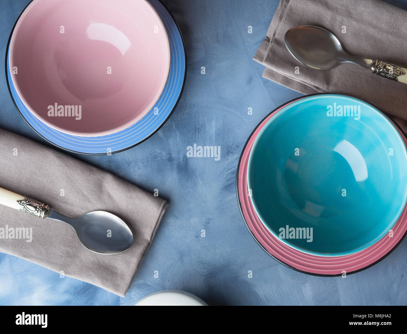 Pastel color Tableware crockery for breakfast or lunch on blue ...