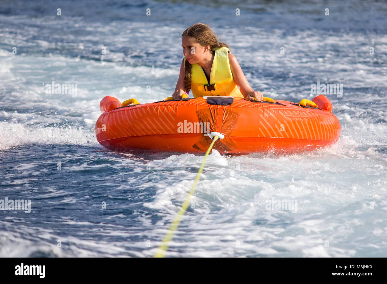Children water sport adventure on the sea Stock Photo - Alamy