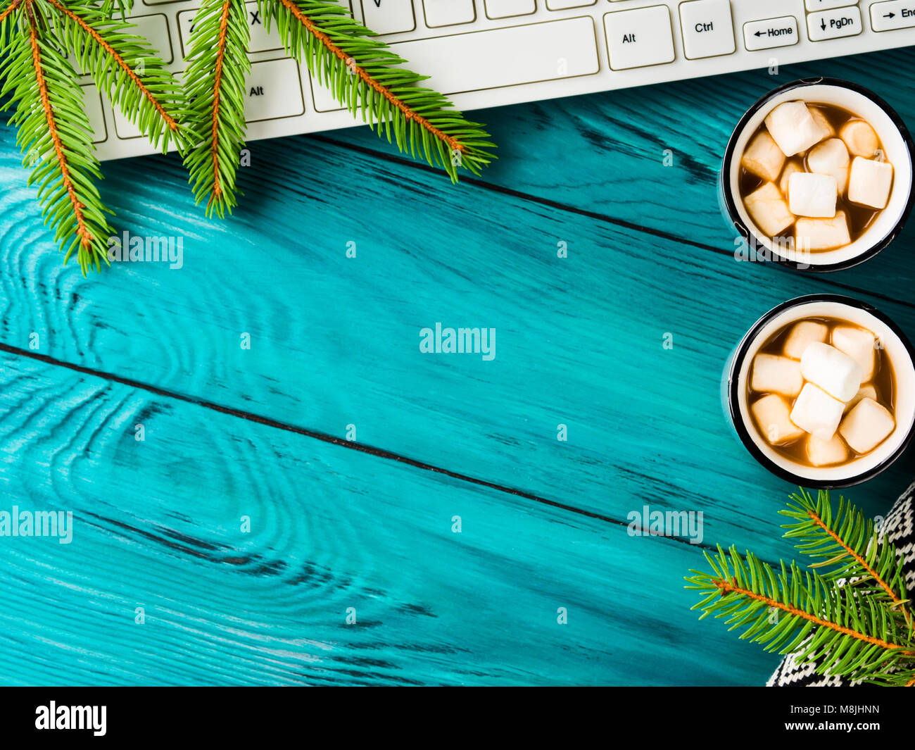 Winter christmas green background with hot chocolate, green branch and ...