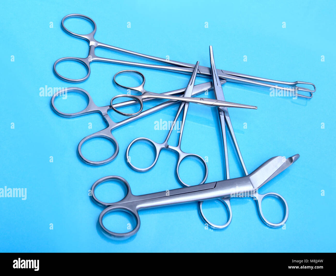 Surgical instruments and tools on table for a surgery Stock Photo - Alamy