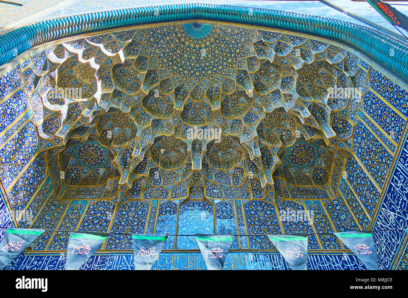 The complex muqarnas vault of the entrance portal of Chaharbagh ...