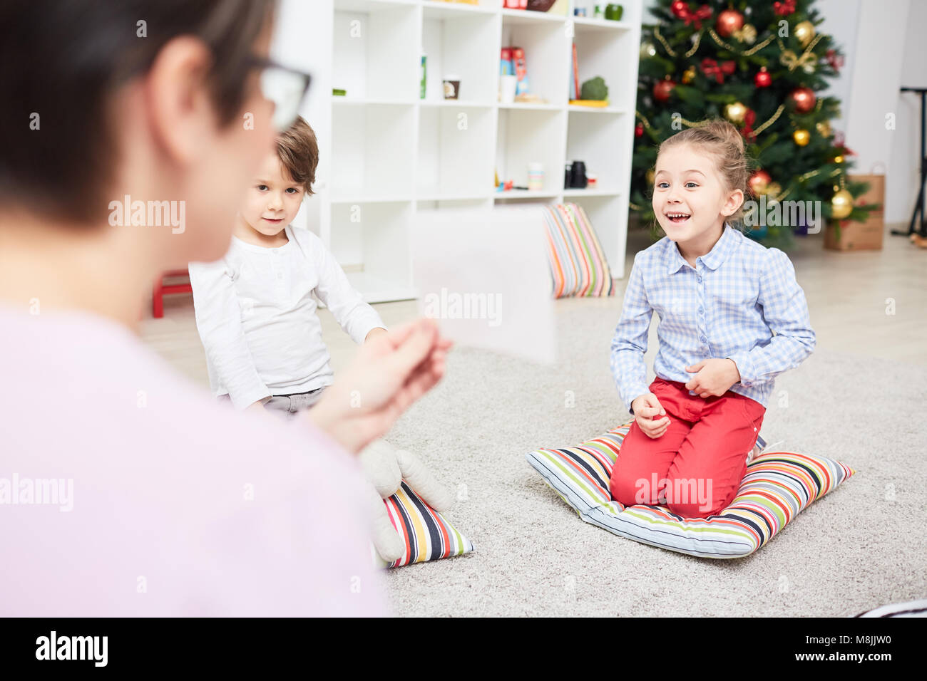 Children talking together and classroom hi-res stock photography and ...