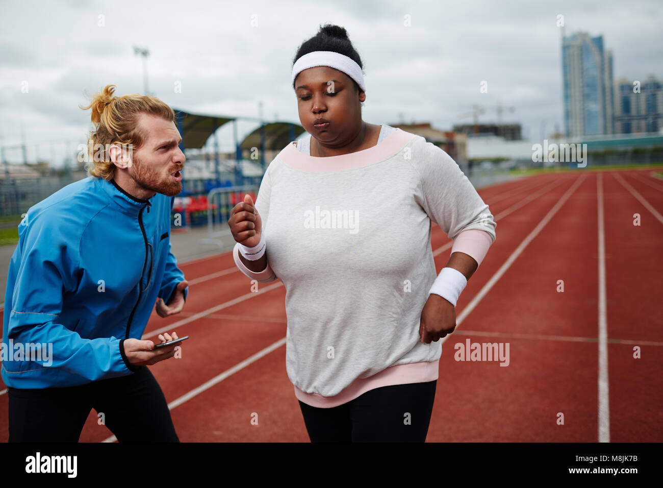 Woman man running practice hi-res stock photography and images - Alamy