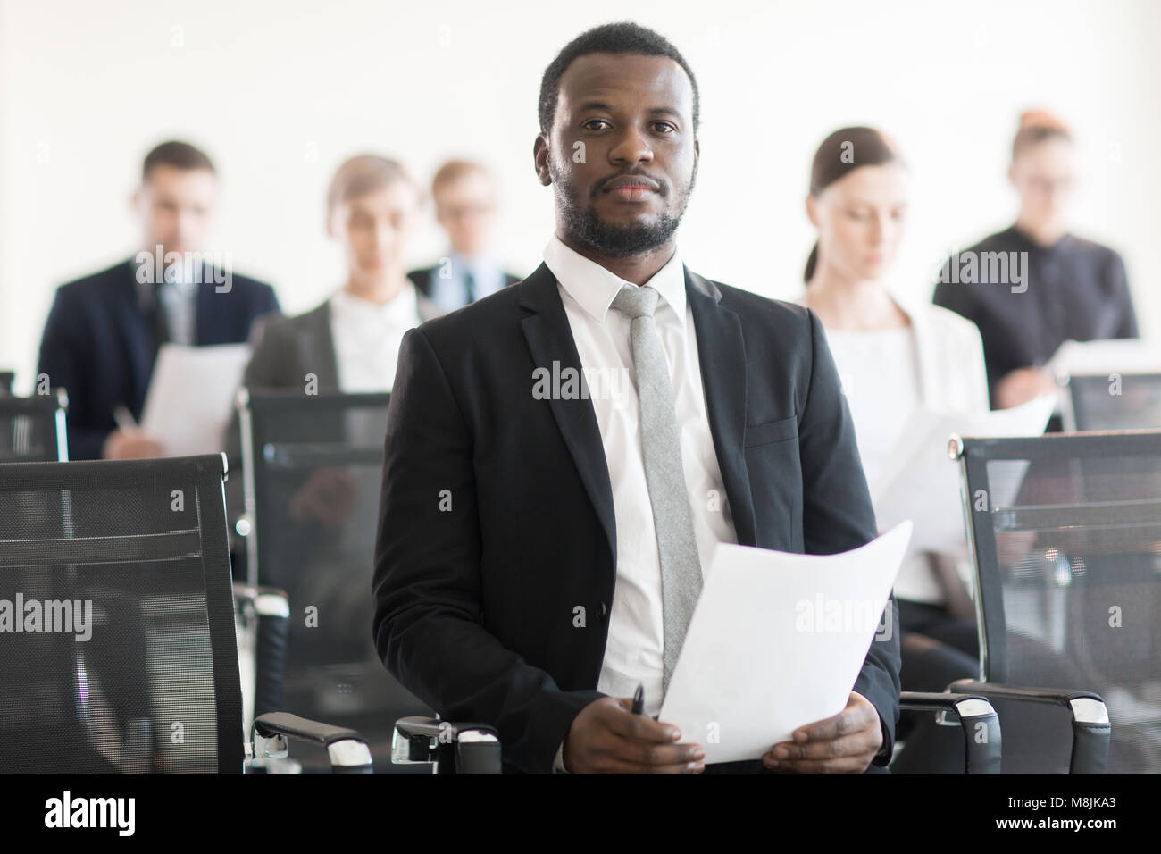 Man at conference Stock Photo - Alamy