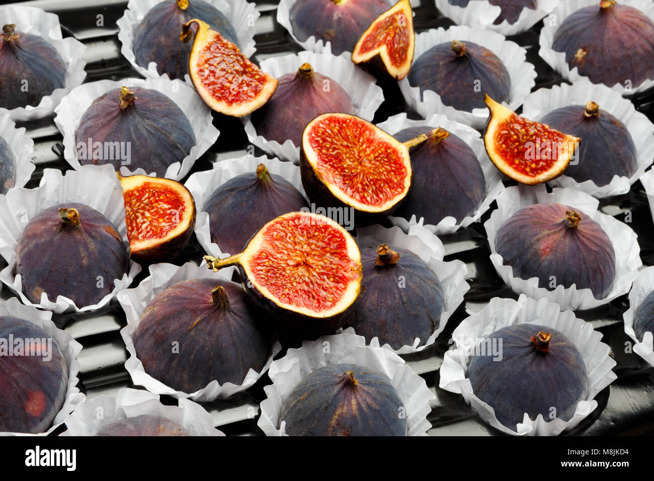 full vegetable box with figs on white background Stock Photo - Alamy
