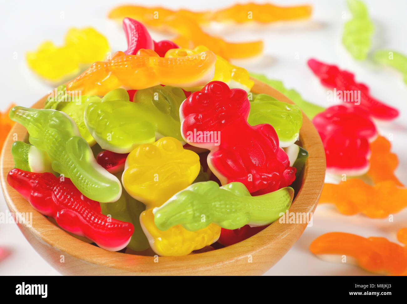 bowl of colorful gummy candies in the shape of animals - close up Stock ...