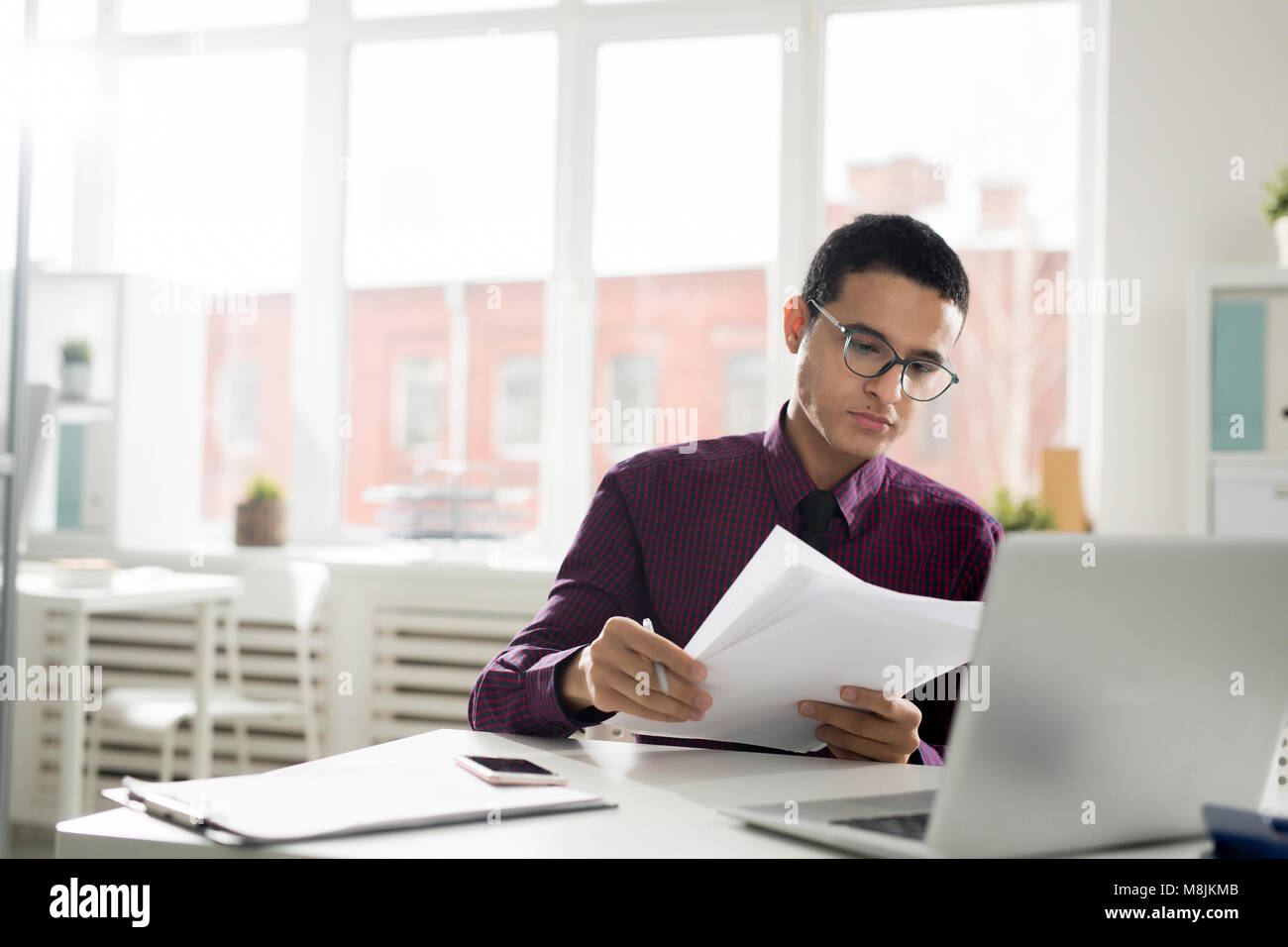 Executive business people reading documents hi-res stock photography ...
