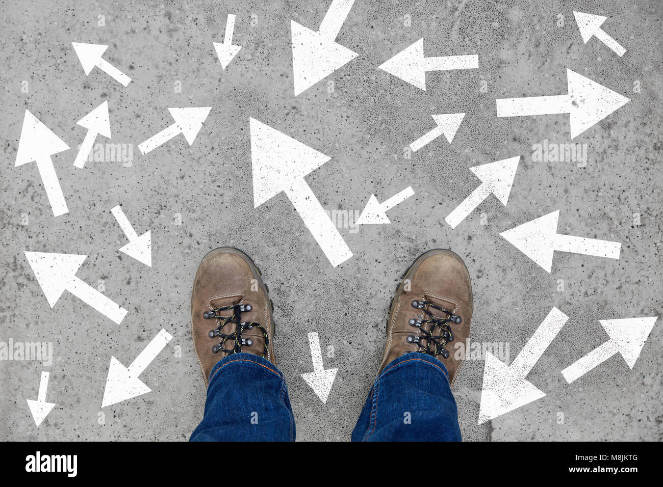 Many arrows on a path as a strategy and decision concept Stock Photo ...