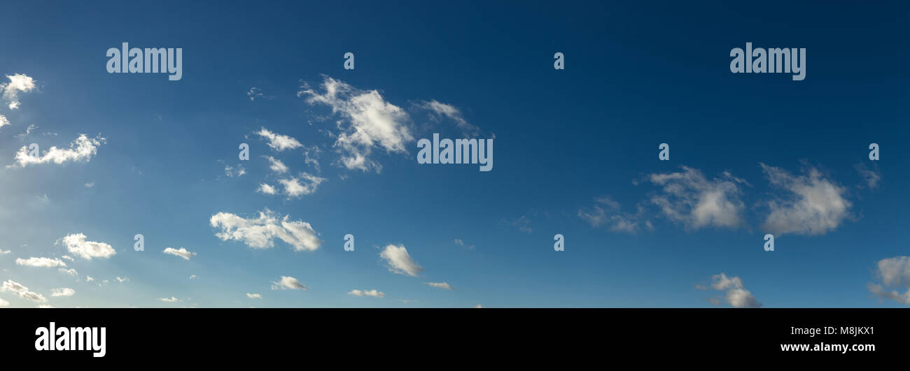Clouds panorama background on blue sky as header Stock Photo - Alamy