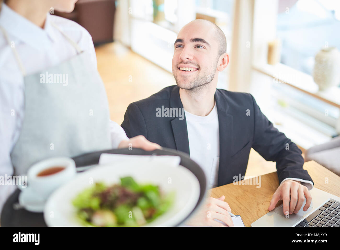 Man at cafe Stock Photo - Alamy