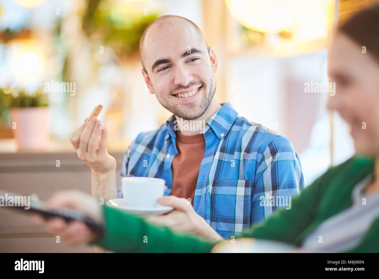 Couple drinking tea Stock Photo - Alamy
