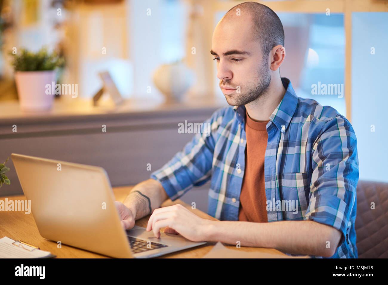 Man working on laptop Stock Photo - Alamy