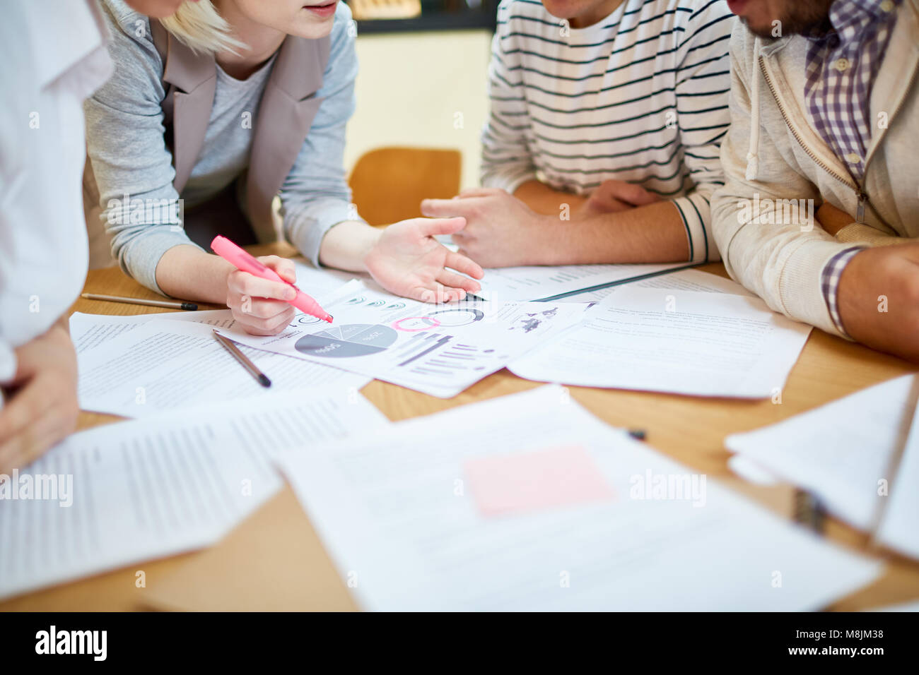 Discussing financial development Stock Photo - Alamy