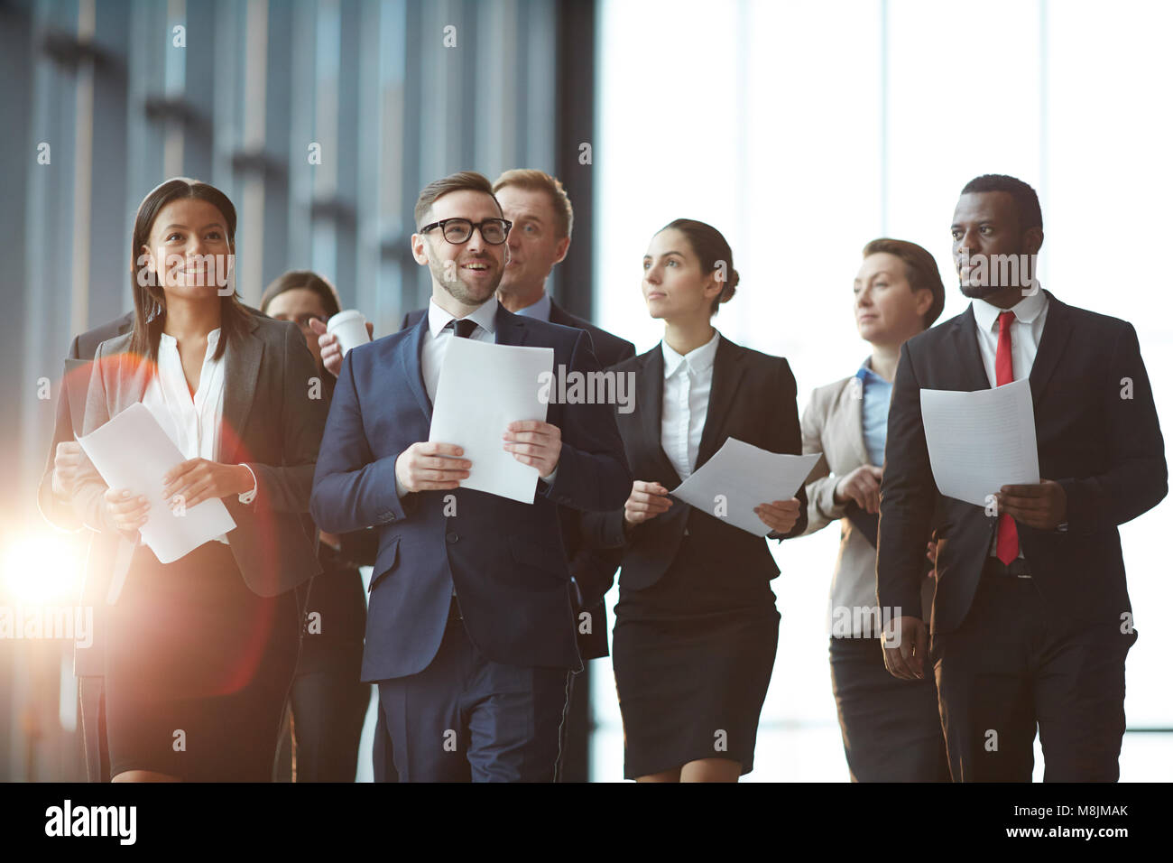 Delegates with papers Stock Photo - Alamy