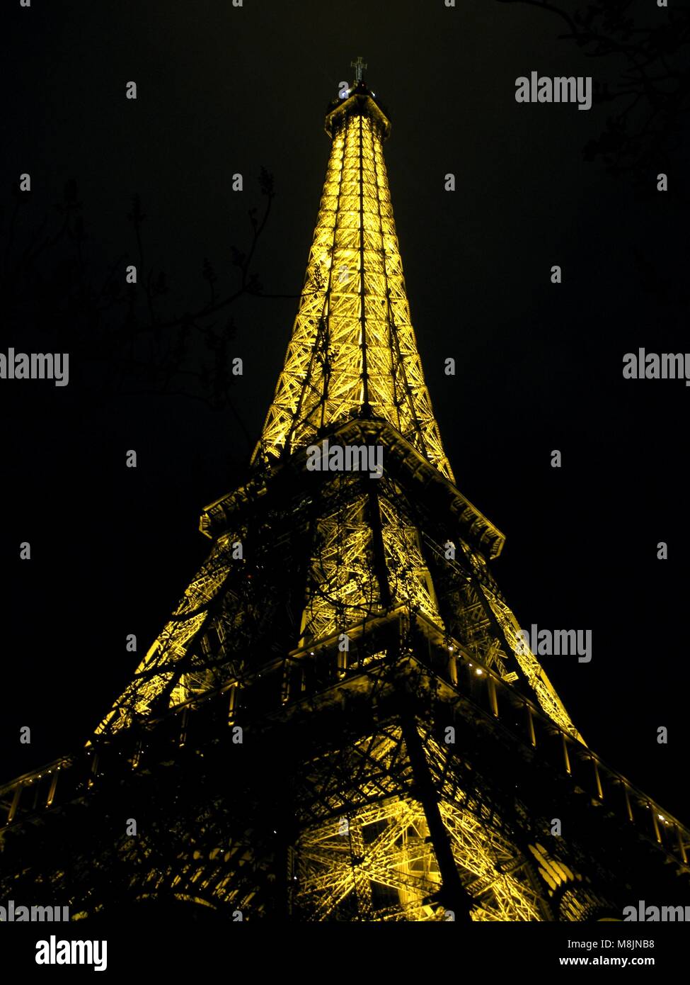 Eiffel Tower illuminated by night Stock Photo - Alamy