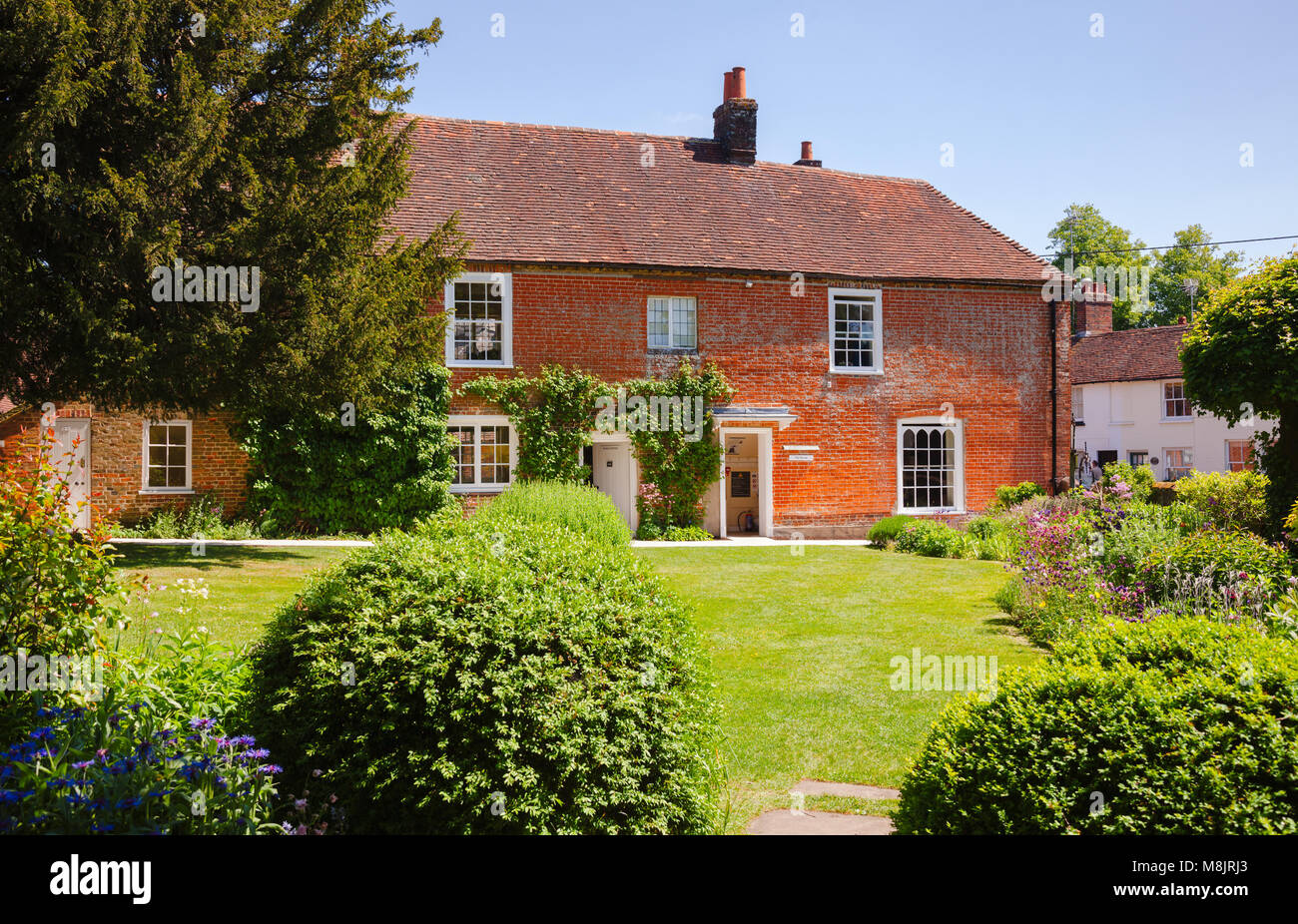 CHAWTON, UK - JUN 8, 2013: Green lawn at formal garden of Chawton ...
