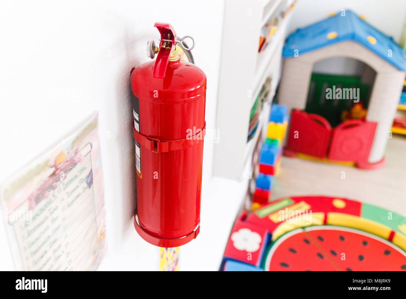 Fire extinguisher for emergency management in kindergarten Stock Photo ...