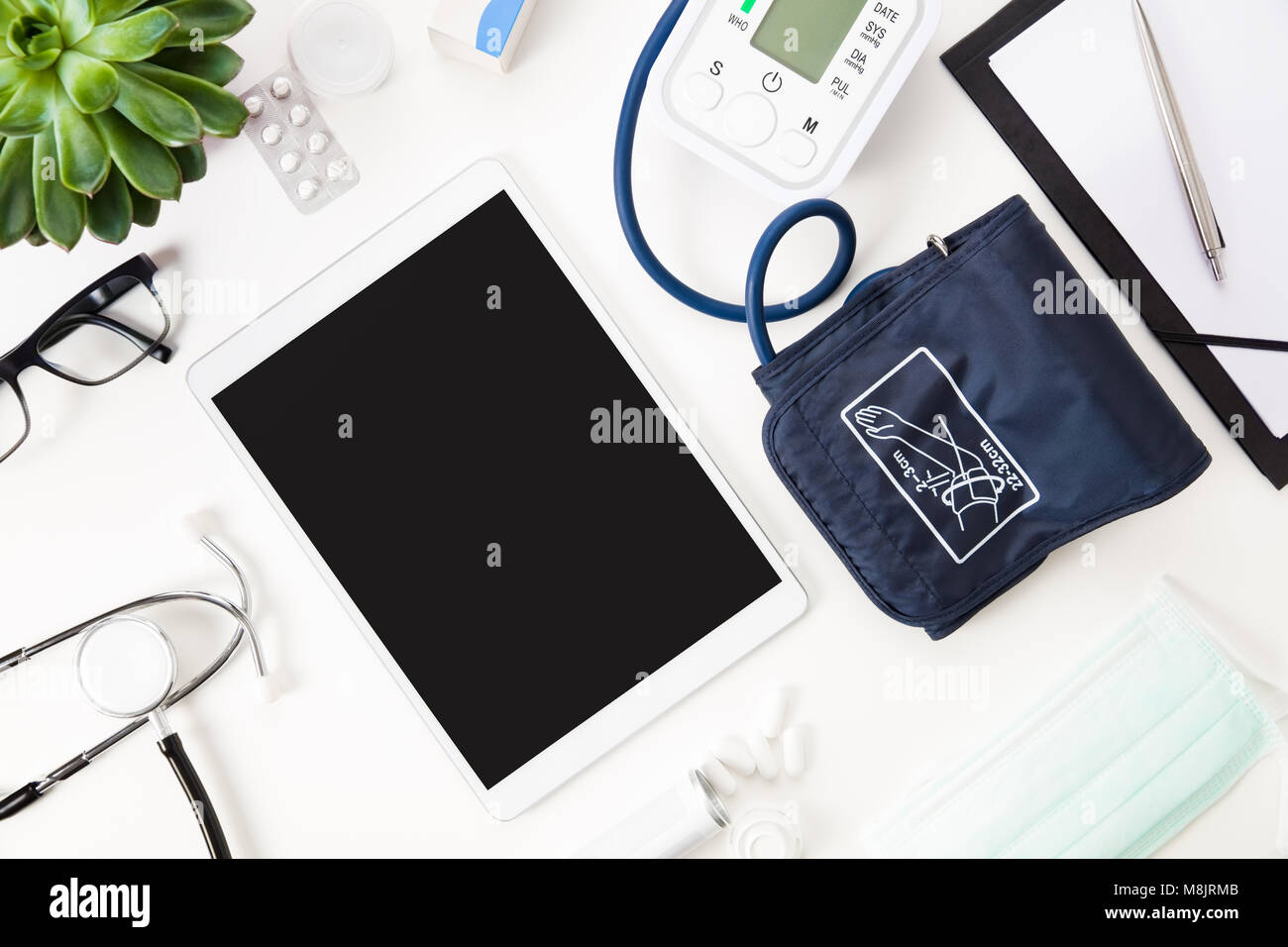 Digital Tablet With Blood Pressure Machine And Other Medical Ins Stock ...