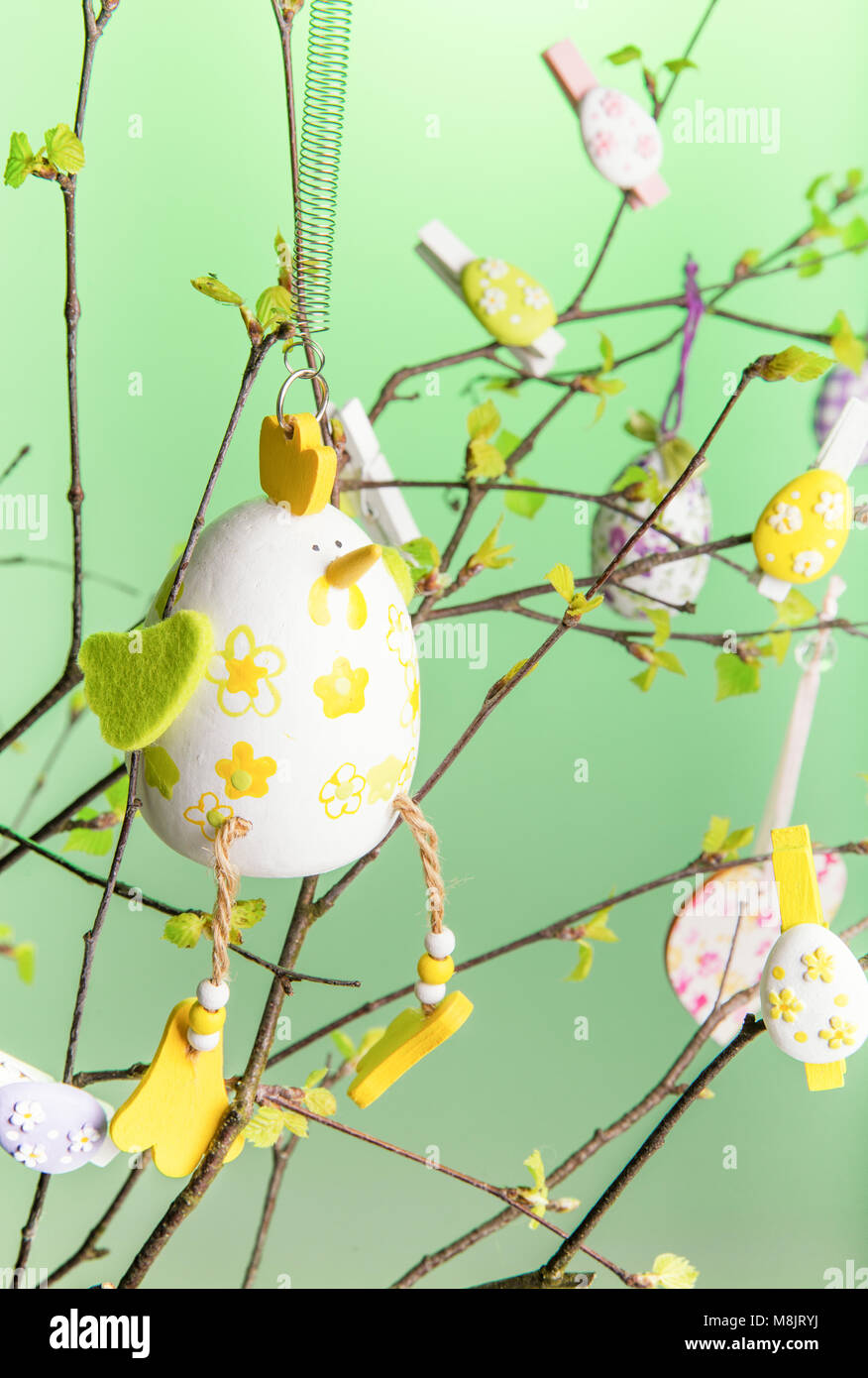 Composition of branches with young leaves and green buds, decorated for ...