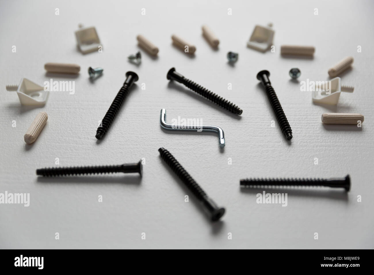 Small furniture assembling parts including screws and screwdriver Stock ...